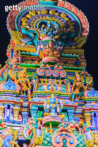 Colorful night view of indian gods sculpture at Sri Maha Mariamman ...