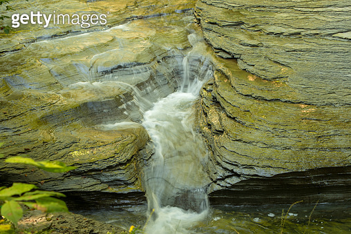 Waterfall on small creek in late summer 이미지 (1045719434) - 게티이미지뱅크