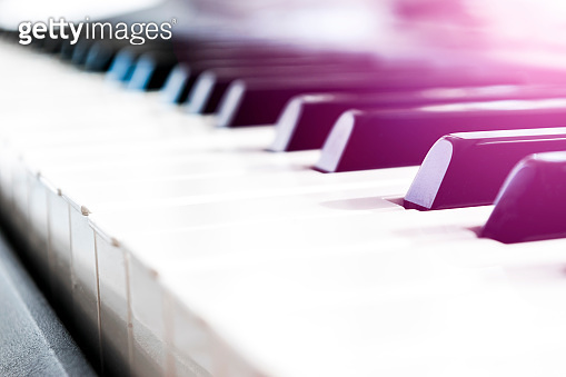 Side view of piano keys. Close-up of piano keys. Close frontal view ...