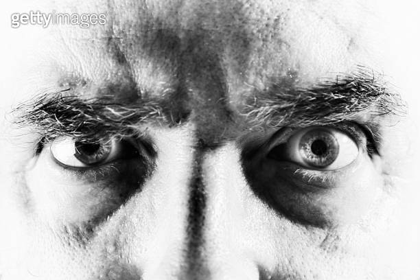 Portrait of mature man looking scary and intimidating 이미지 (909467986 ...