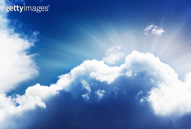 Beams of light shining behind cloud symbolize faith, hope, redemption ...