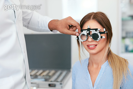Eye Exam. Woman In Glasses Checking Eyesight At Clinic (1064562818 ...