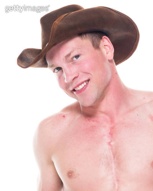 Sexy cowboy in underwear is playing the guitar 이미지 (1065974946) - 게티이미지뱅크
