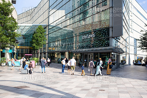 Busy Shoppers in St David's Dewi Sant Shopping Centre, Cardiff walking ...