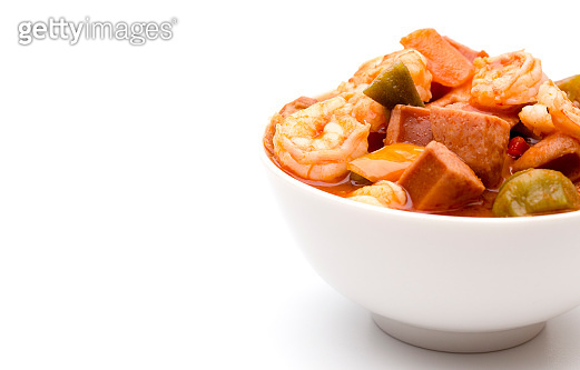 A Bowl of Cajun Seafood Gumbo on a White Background (928996806) - 게티이미지뱅크