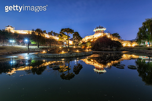 Reflection of Suwon Hwaseong fortres at night in Suwon.Korea (929670480 ...