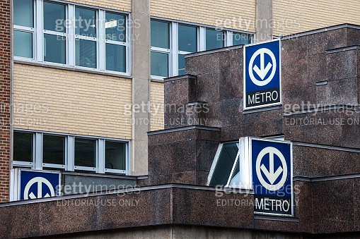 Blue Signs indicating a subway station with its distinctive logo on the ...