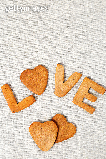 Edible letters of the word love. Shortbread cookies in the form hearts ...