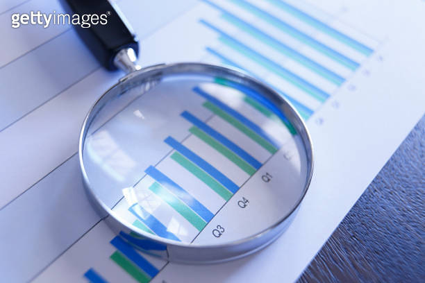 Magnifying Glass On Top Of Bar Chart Showing Positive Performance 이미지 ...