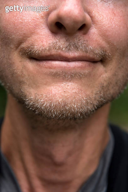 Close-up of man's lips and nose with scruffy facial hair 이미지 (918681968 ...