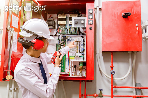 Engineer checking Industrial fire control system,Fire Alarm controller ...