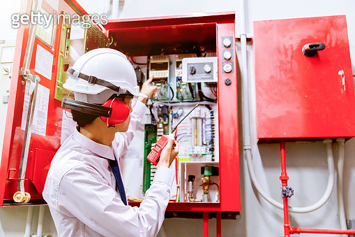 Engineer checking Industrial fire control system,Fire Alarm controller ...