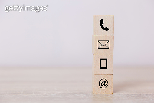 Wood block symbol telephone, address,mail and mobile phone.The concept ...