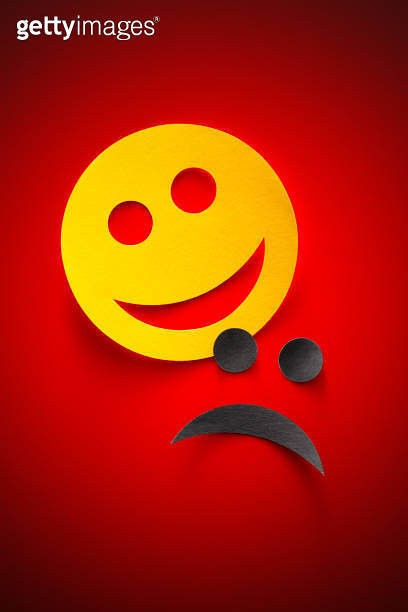 Happy and sad emoji smiley faces (or comedy and tragedy theater mask ...