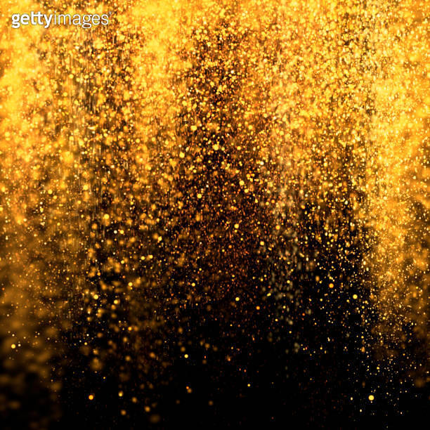 Gold sparkling dust falling from the sky 이미지 (1074972632) - 게티이미지뱅크