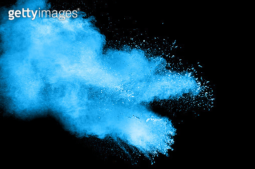 abstract blue dust explosion on black background ,abstract blue powder ...