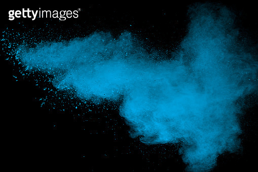 abstract blue dust explosion on black background ,abstract blue powder ...