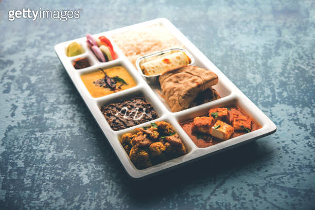 Indian vegaterian Food Thali or Parcel food-tray with compartments in ...