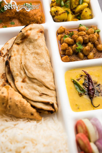 Indian vegetarian Food Thali or Parcel food-tray with compartments in ...