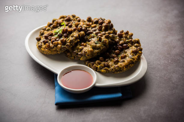 Chana Dal Bhabra / Babra served with tomato ketchup, popular food from ...