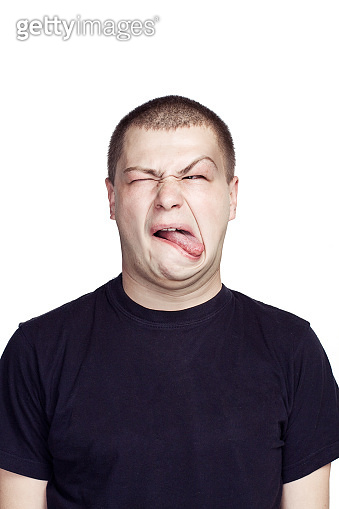Portrait of young man. Facial expression. Disgusting face. 이미지 ...