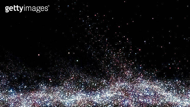 The silver dust spread like waves of water. A pile of silver sand near ...