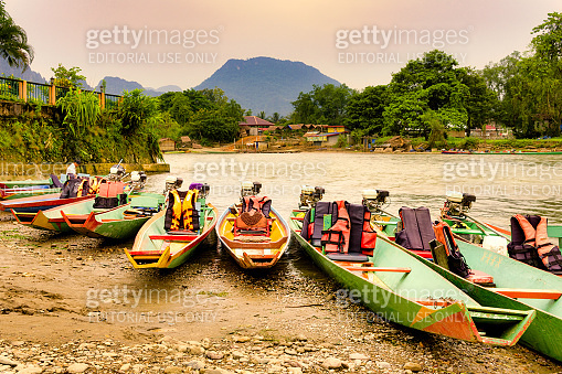 Tour guide with Kayak Canoes on Nam Song River, Vang Vieng, Laos ...