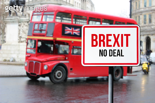 Blurred London street view with red double decker bus and Brexit no ...
