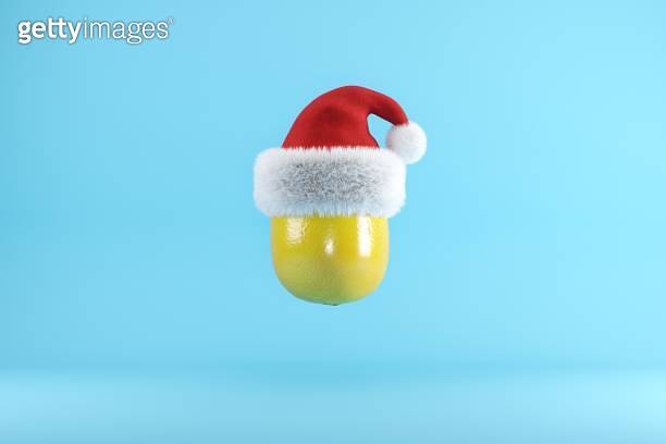 Lemon with Santa Hat floating on blue background , Christmas Fruit ...