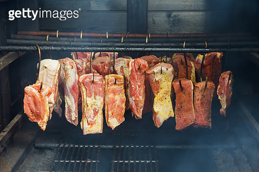 Traditional food smoked ham, bacon, pork neck in a smokehouse. 이미지 ...