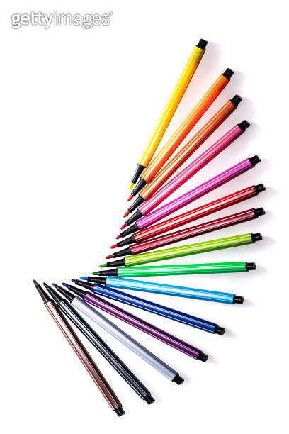 Bright multi-colored felt-tip pens on a white background. Felt pens are ...