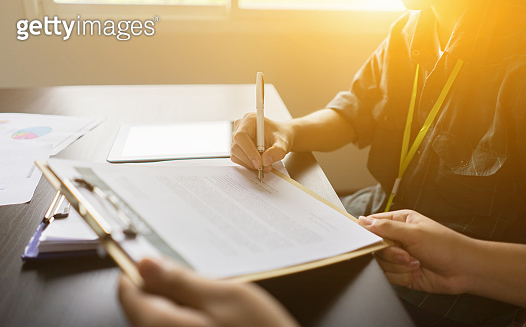 Businessperson Signing Contract about insurance, Two men writing with ...