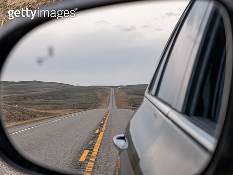 Looking Down the Road from Car Side Mirror 이미지 (1152550891) - 게티이미지뱅크