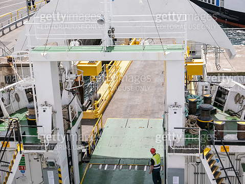 View from top deck of a roll on roll off, RORO, ferry with bow ramp ...