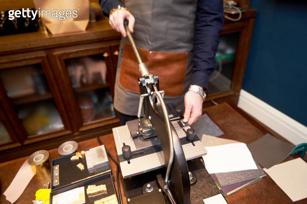 Working process of making leather wallet in the leather workshop, close ...