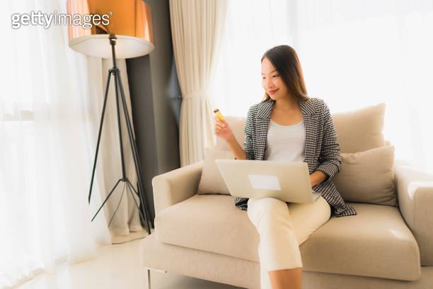 Portrait beautiful young asian women using computer laptop or smart and ...