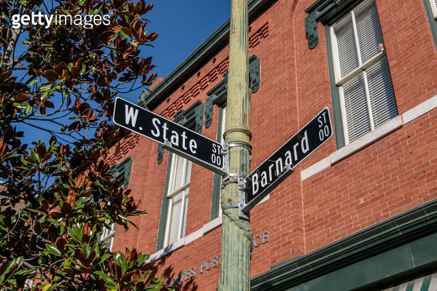Street signs at the corner of West State and Barnard streets in ...