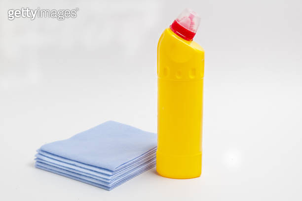Cleaning wipes and a yellow bottle with cleaning agent 이미지 (1184903533 ...