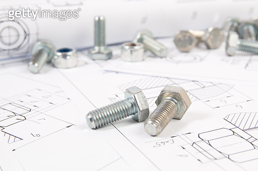 Technical drawings of bolts and nuts. Engineering, technology and ...