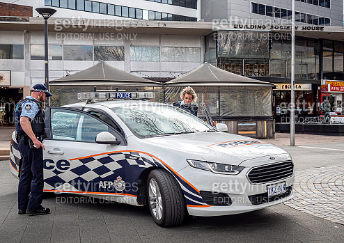 An Australian Federal Police (AFP) car parked on the public area ...