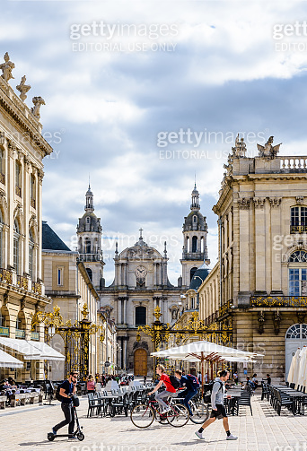 Sidewalk cafe on the place Stanislas and cathedral in Nancy, France ...