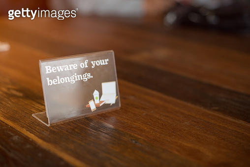 Beware of your belongings sign place on the table. 이미지 (1133407793 ...
