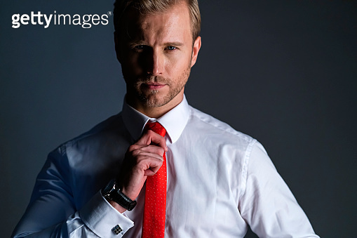 smart handsome caucasian businessman white shirt hand touch red neck ...