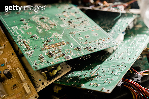 Stack of parts of demounted gadgets ready to be examined and repaired ...