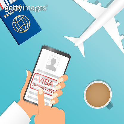 Hand holding black smartphone and finger touch on visa approved blank ...