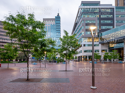 Downtown meeting outdoor meeting center surrounded by tall buildings ...