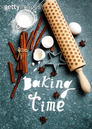 Baking time. Flour sprinkled on the blue table with text baking time ...