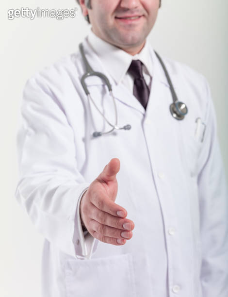 Happy smiling cheerful doctor giving hand for handshaking 이미지 ...