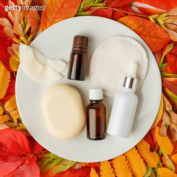 Spa, sauna and wellness setting with soap, aroma oil, oil essence, on ...