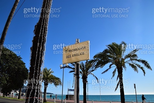 Promenade des Anglais, Nice street sign with palm trees (1190827508 ...